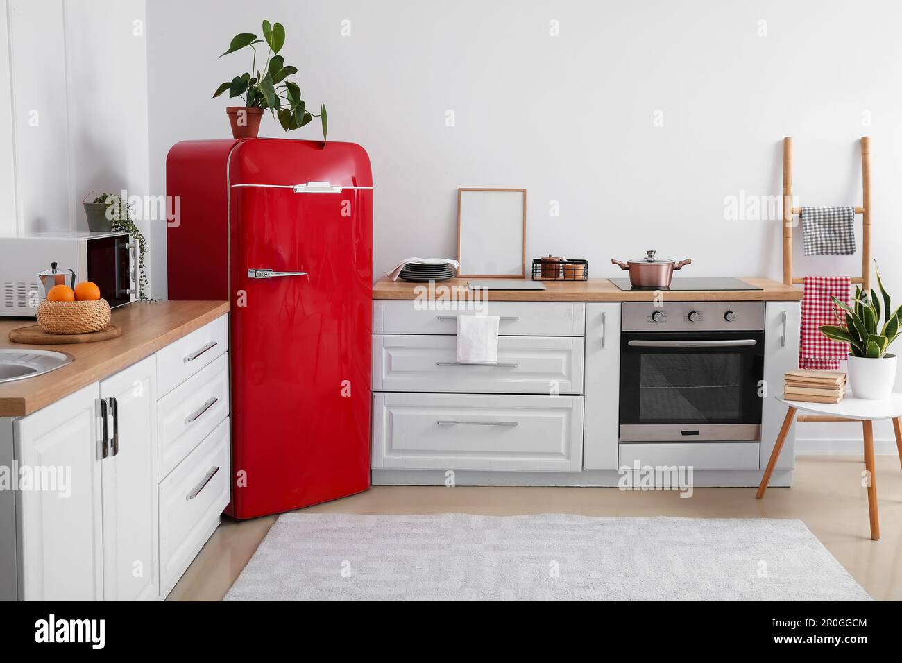 Interior of modern kitchen with stylish refrigerator Stock Photo - Alamy