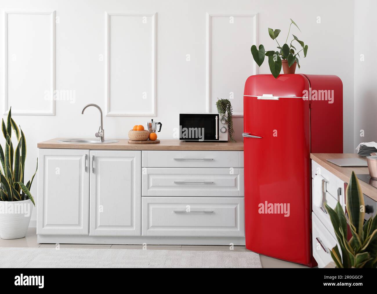 Interior of modern kitchen with stylish refrigerator Stock Photo - Alamy