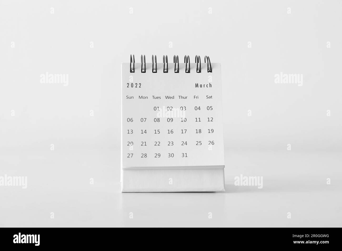 Flip calendar for March on light background Stock Photo - Alamy