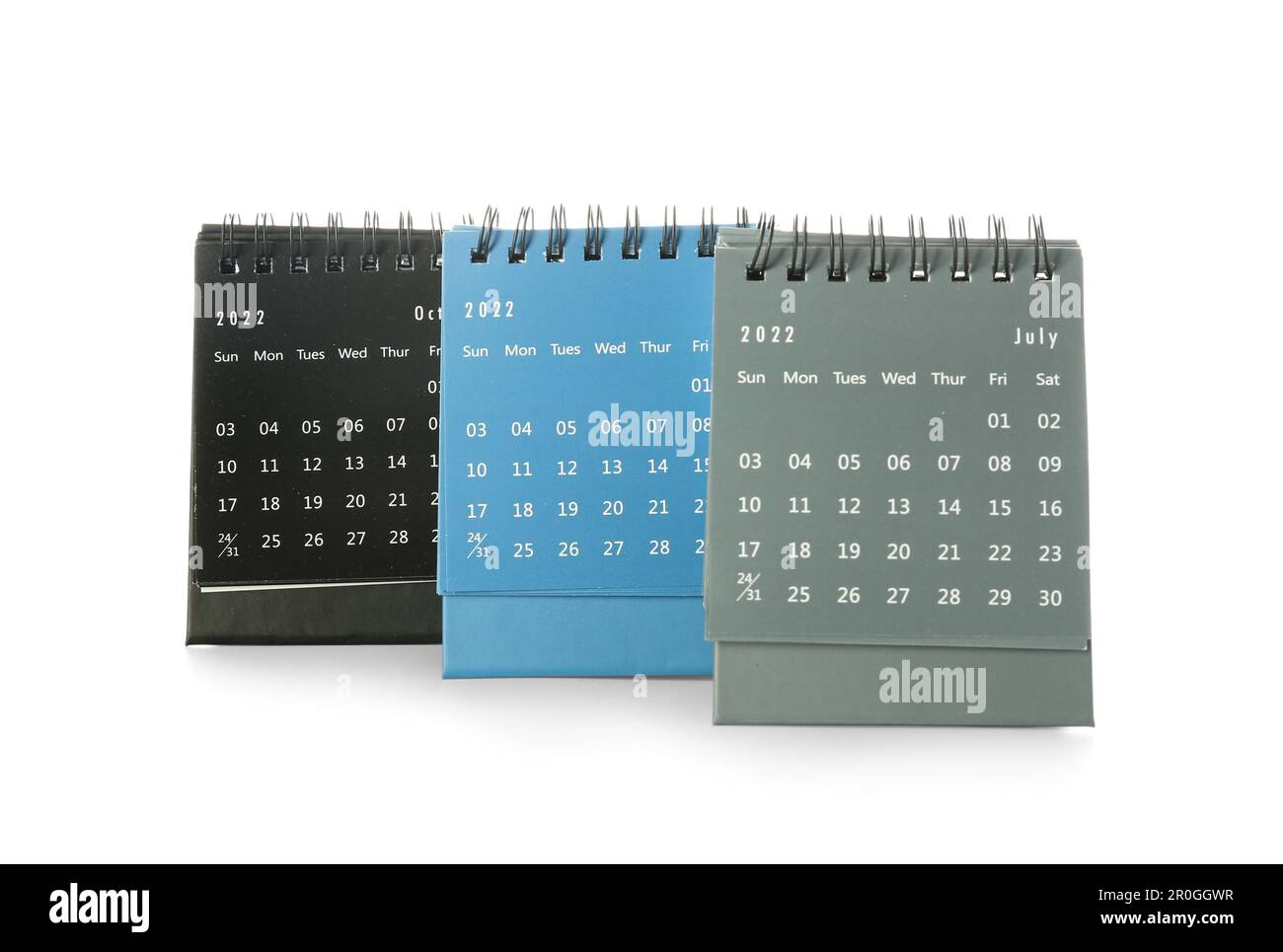 Flip calendars on white background Stock Photo - Alamy