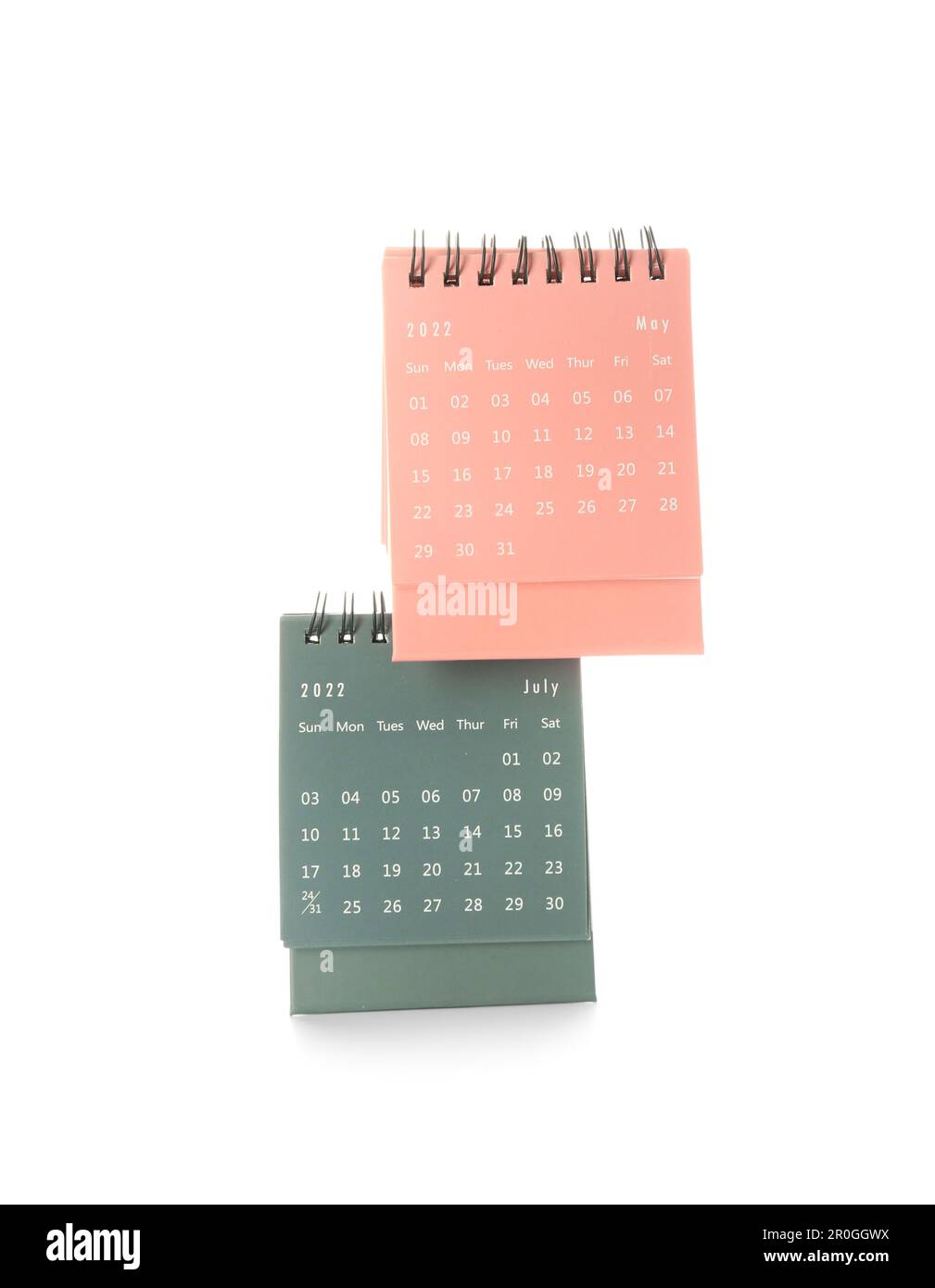 Flip calendars on white background Stock Photo - Alamy