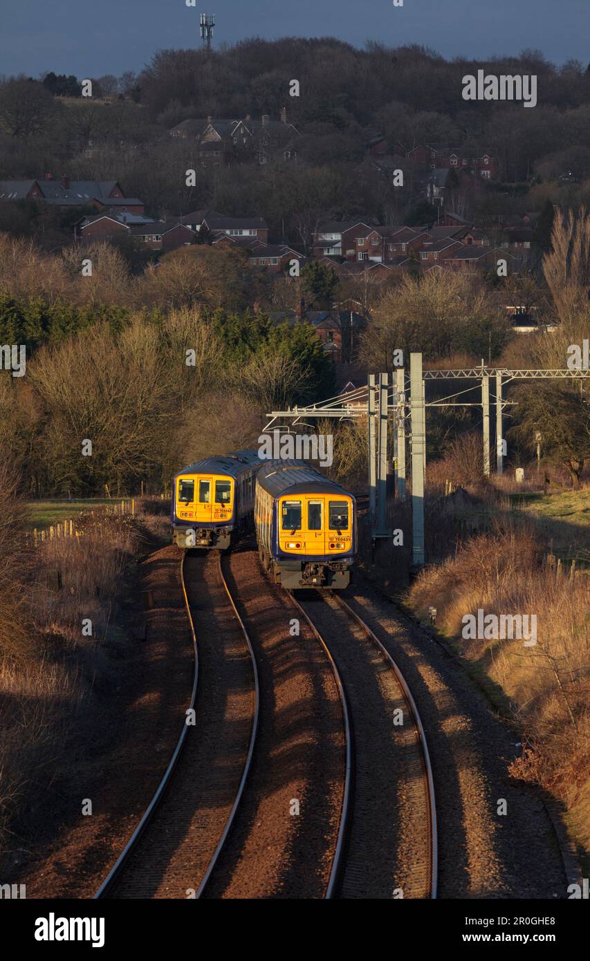 2 Northern Rail class 769 flex bi mode trains passing at Lostock ...