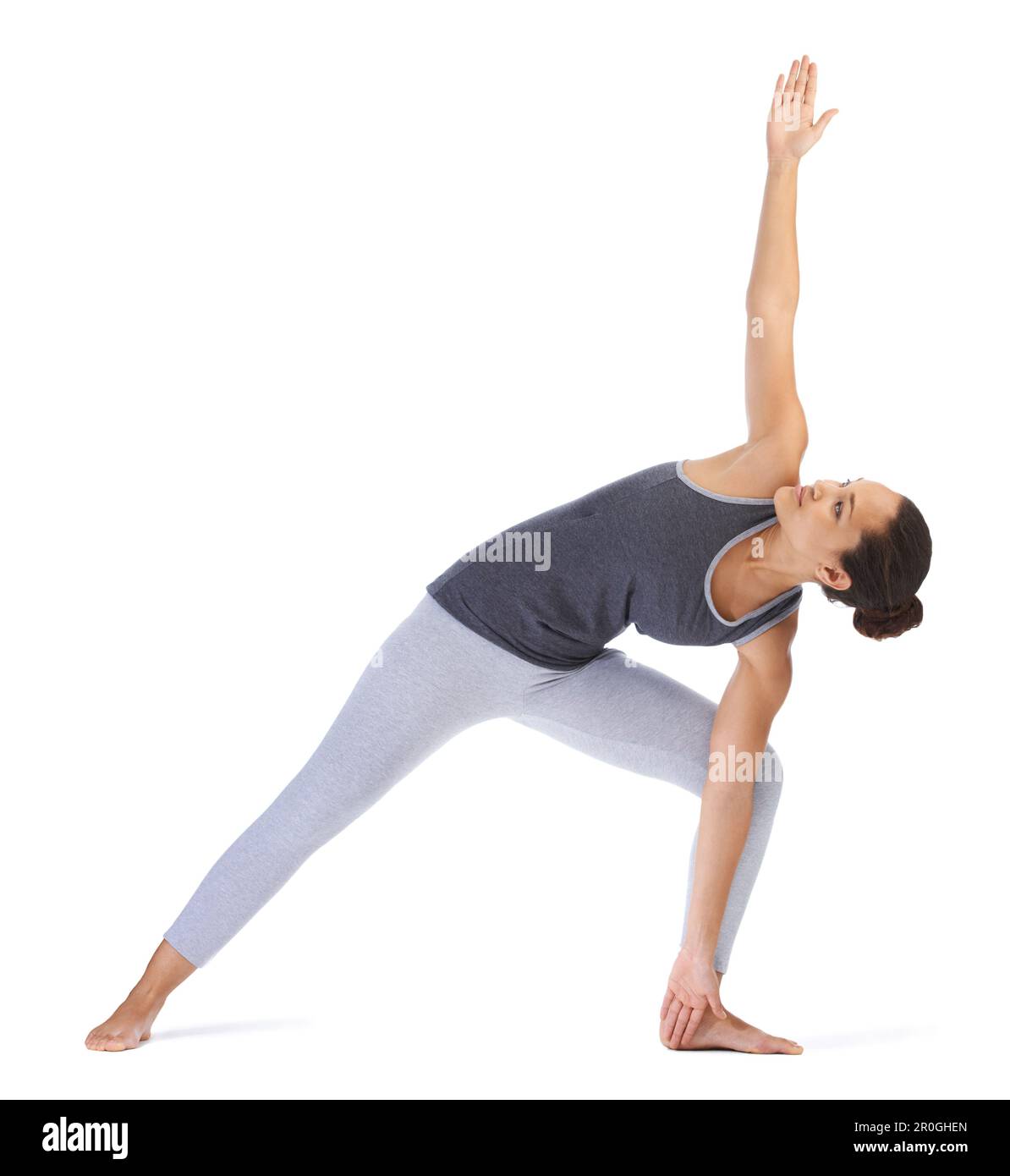 Exercise brings inner peace. A beautiful young woman doing a yoga pose ...