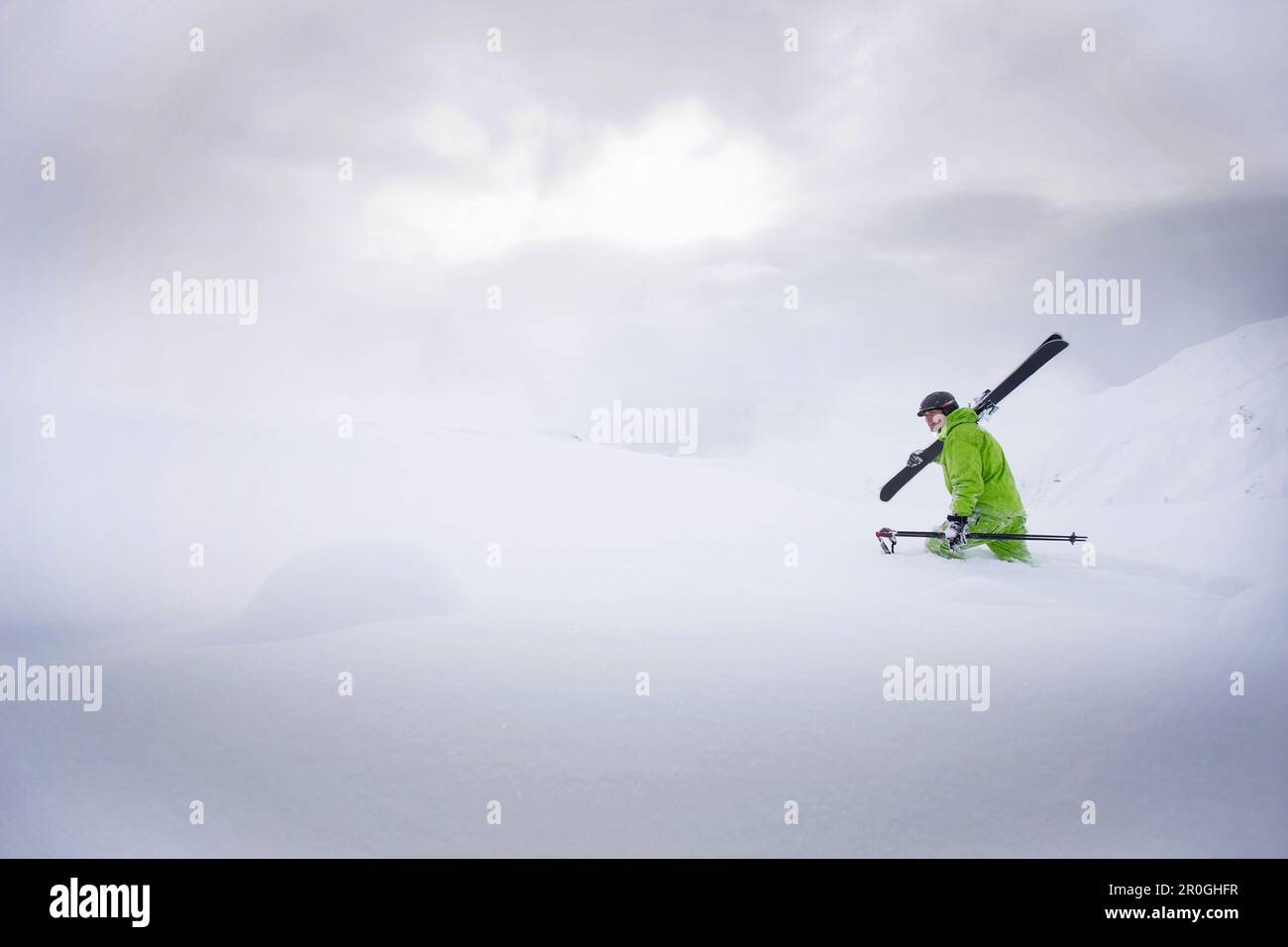 Male free skier ascending in deep snow, Mayrhofen, Ziller Valley, Tyrol ...