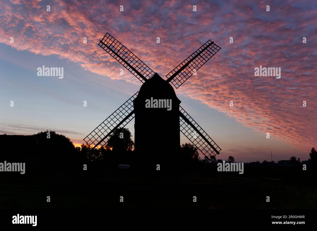 Post windmill Gross Ernsthof in dawn, Open-Air Museum Klockenhagen ...