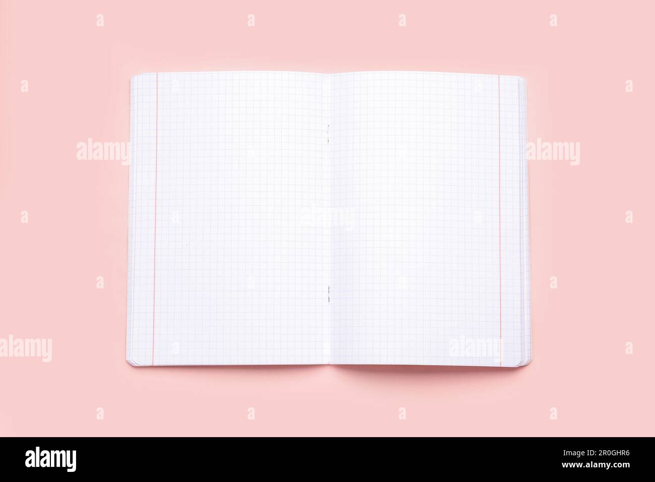 Blank copybook pages on pink background Stock Photo - Alamy