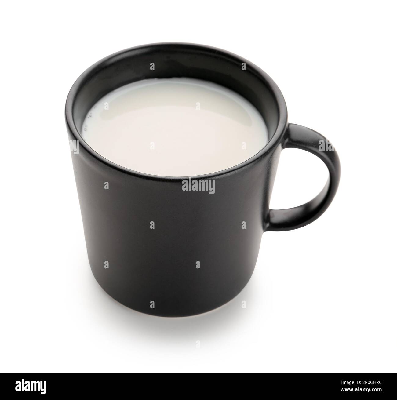Cup of milk on white background Stock Photo - Alamy