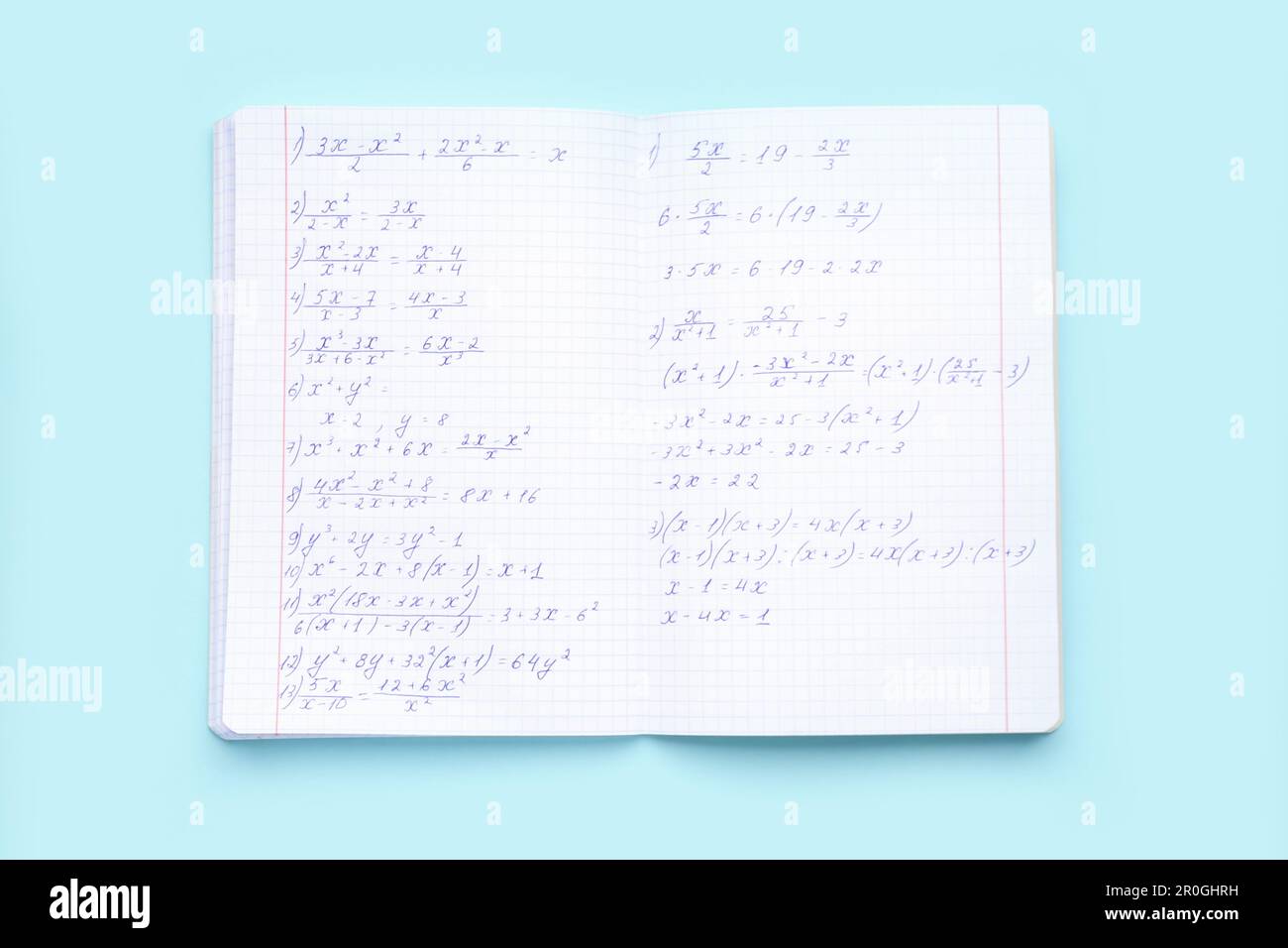 Copybook with maths formulas on blue background Stock Photo - Alamy