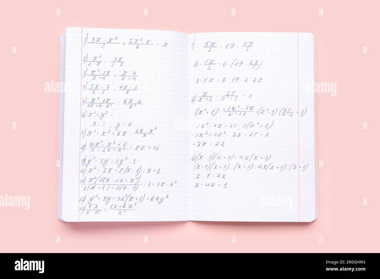 Copybook with maths formulas on pink background Stock Photo - Alamy