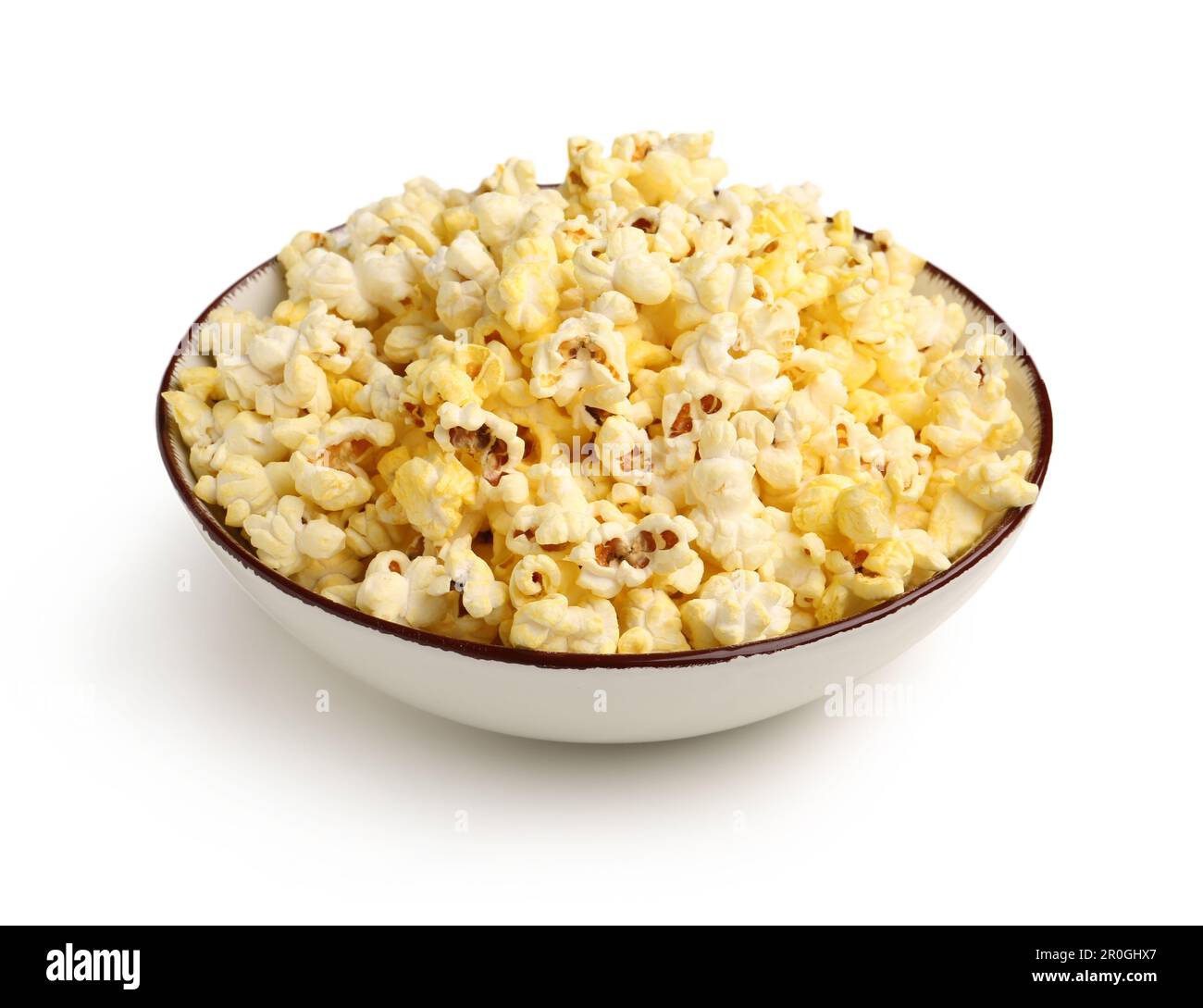 Bowl with crispy popcorn on white background Stock Photo - Alamy