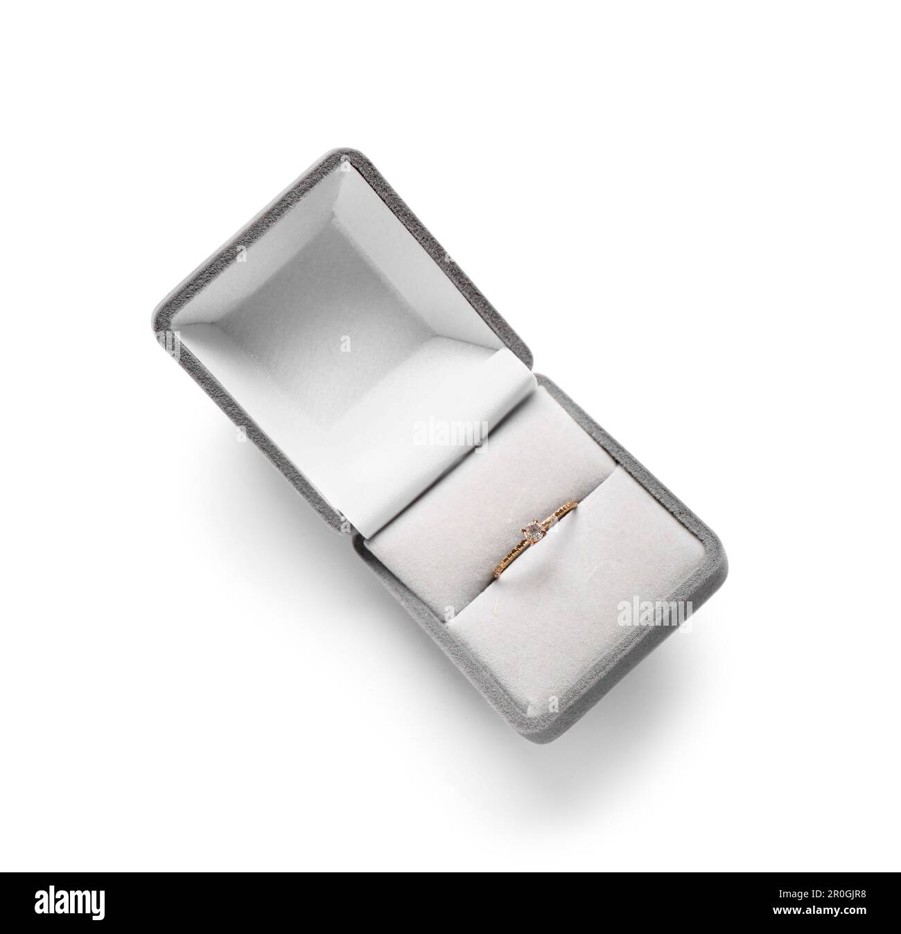 Box with engagement ring on white background Stock Photo - Alamy