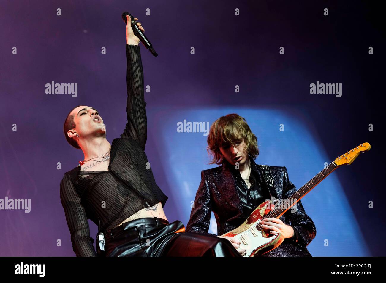 Damiano David, left, and and Thomas Raggi of Maneskin perform on stage ...