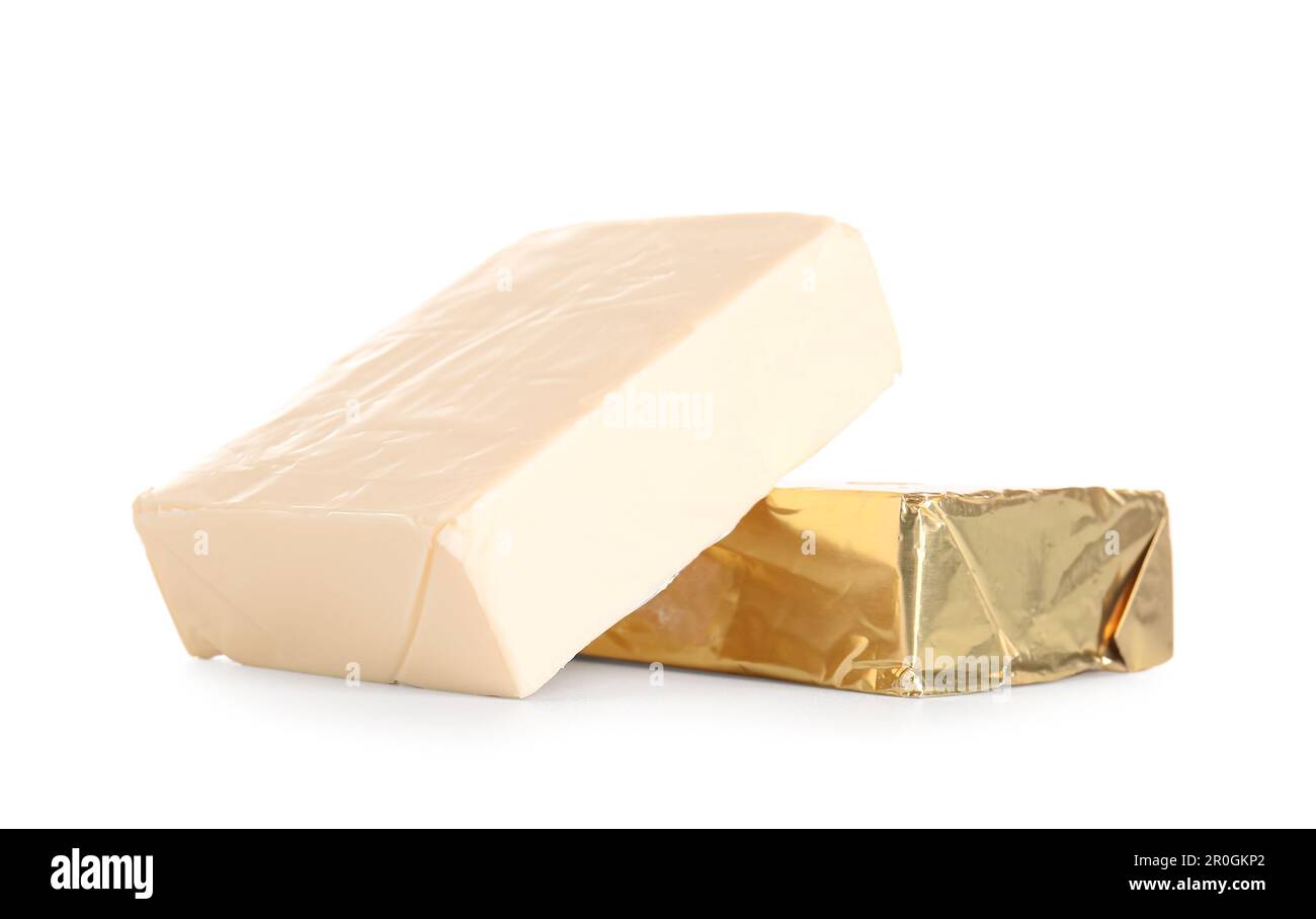 Processed cheese in foil isolated on white background Stock Photo - Alamy