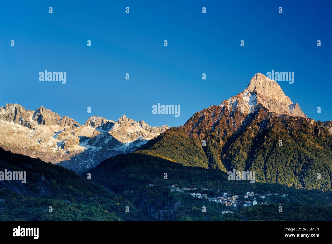 Mountain Piz Badile under blue sky, Val Camonica, UNESCO World Heritage ...