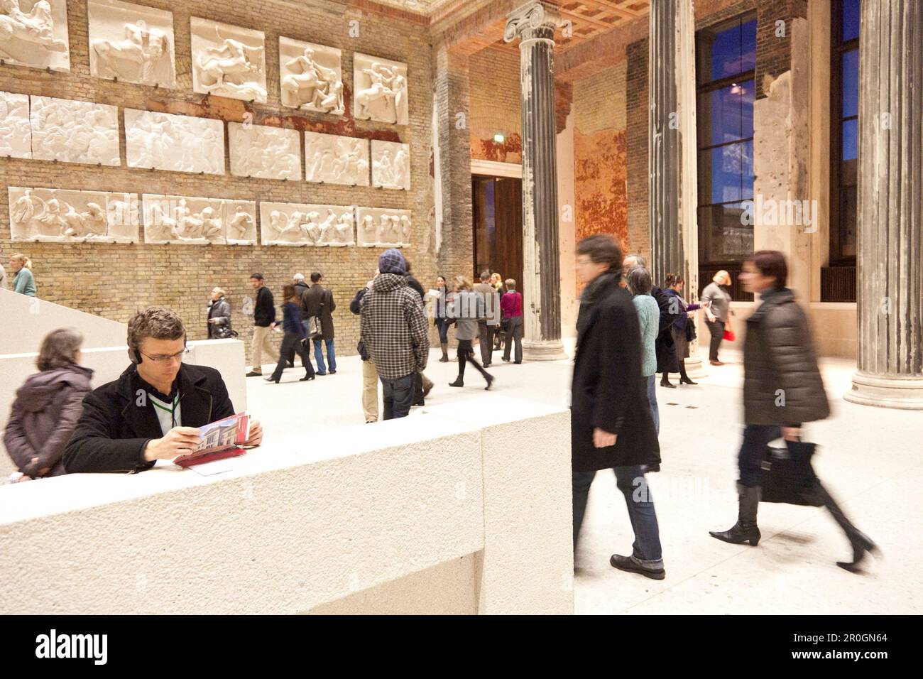 Visitor with audio guide inside of the Neues Museum (New Museum ...