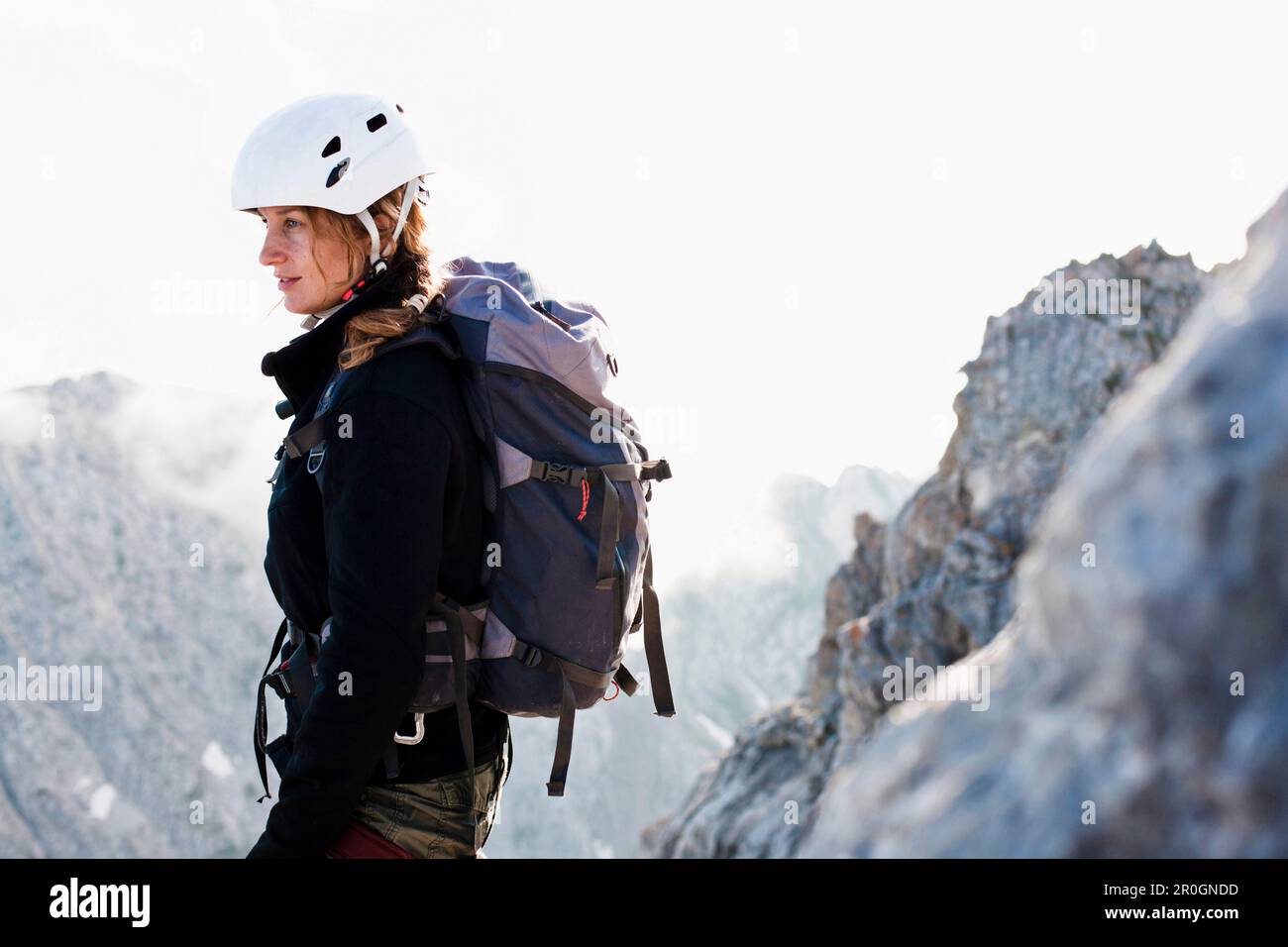 Female mountaineer at Ellmauer Halt, Wilder Kaiser, Kaiser Mountain ...