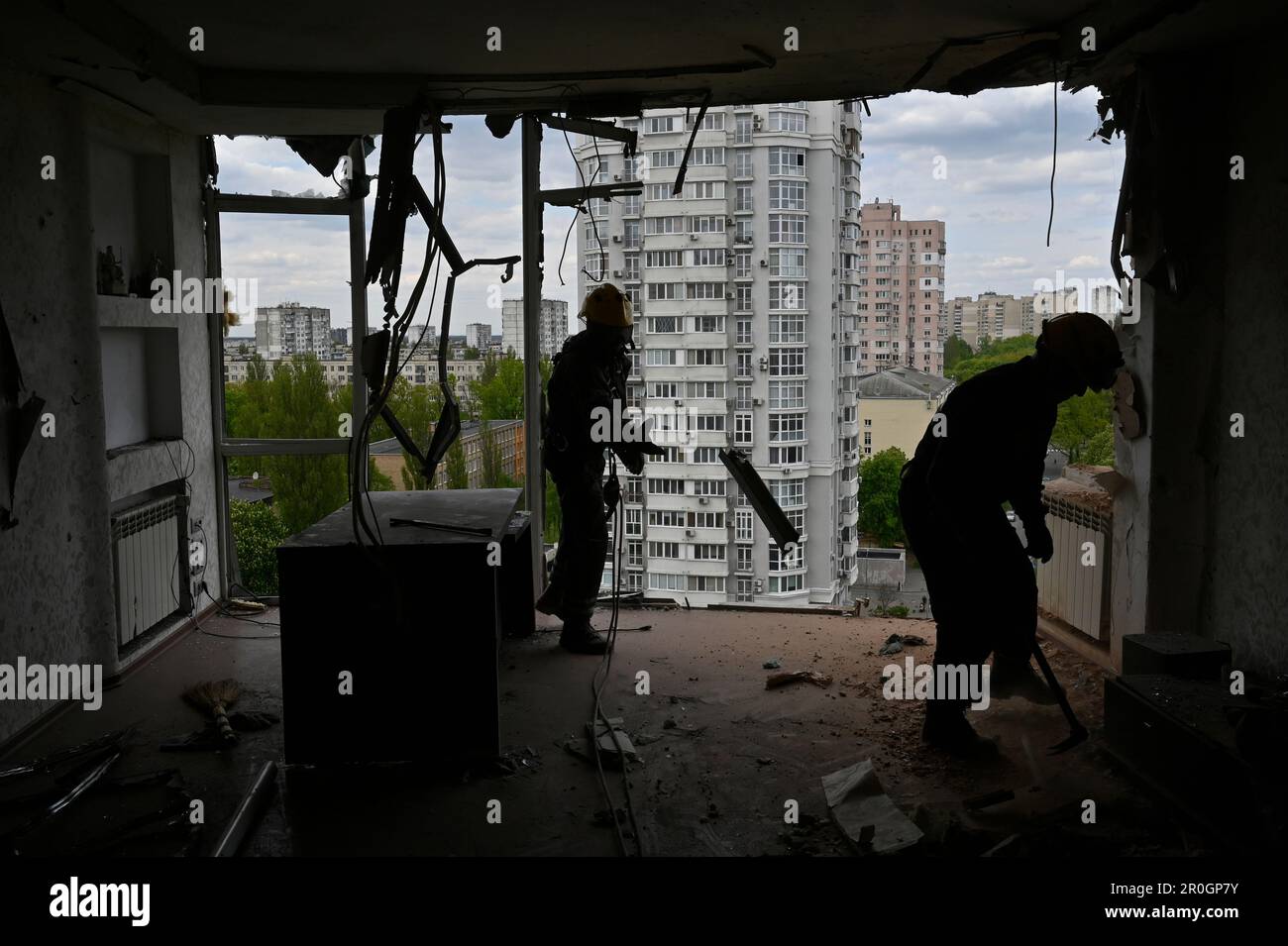 Kyiv, Ukraine. 08th May, 2023. Rescuers seen in multi-storey ...