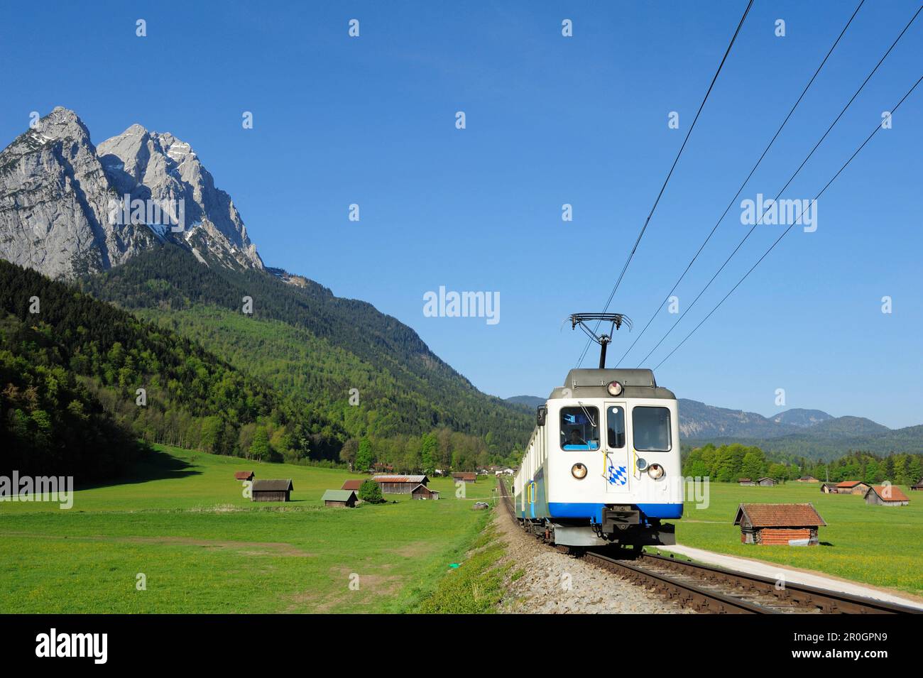 Bavarian cog railway to Zugspitze in front of Zugspitze range with ...