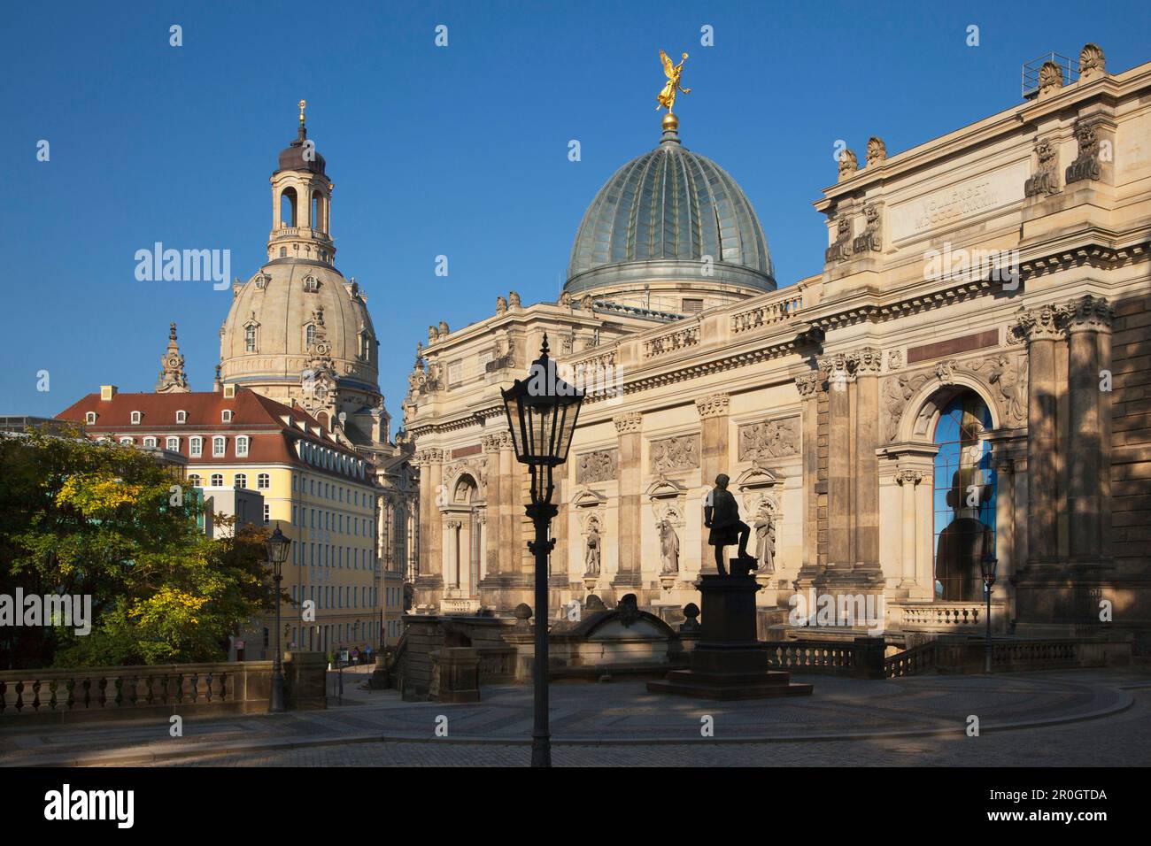 Frauenkirche and University of visual arts with glass dome and statue ...