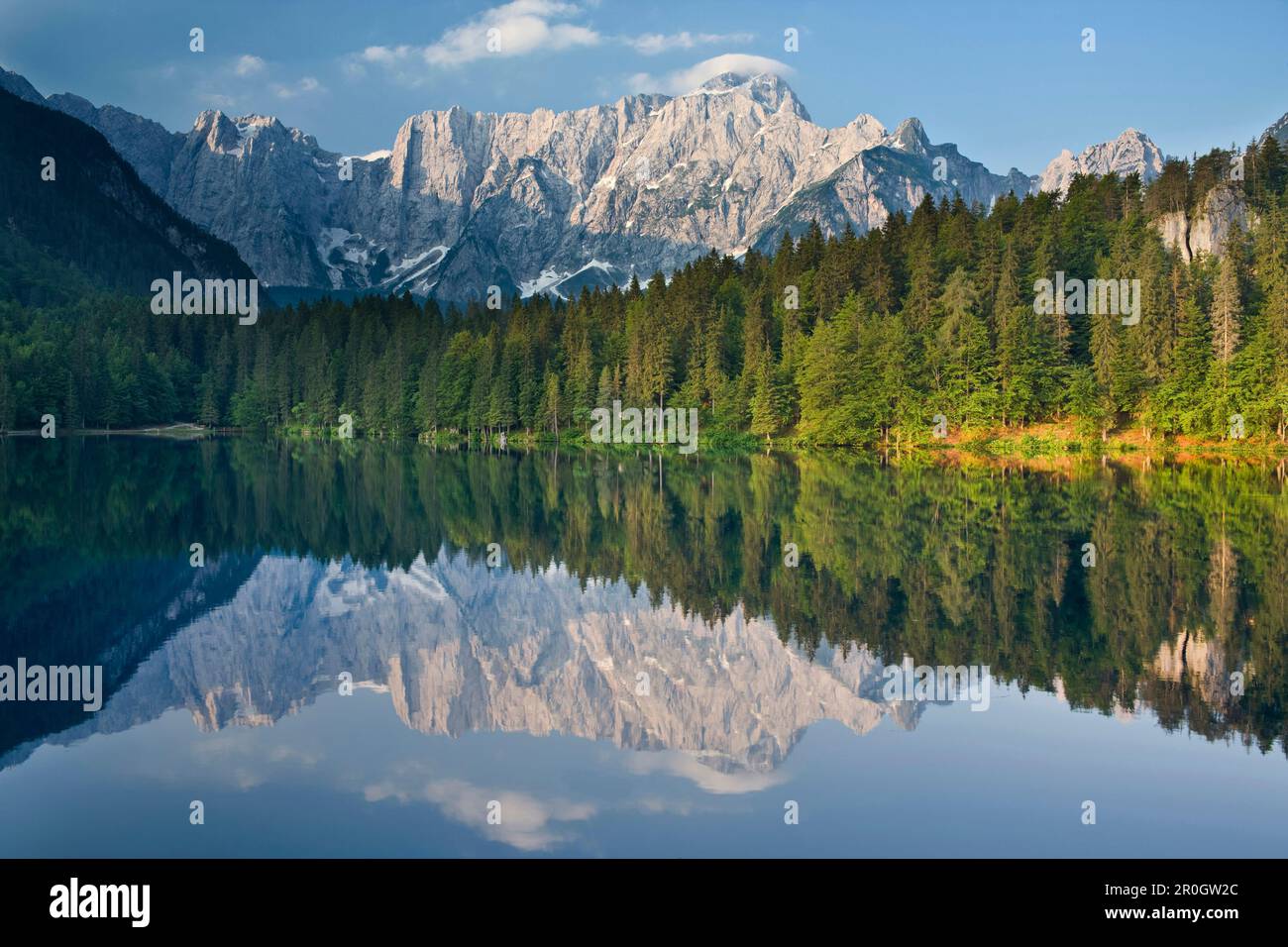 Reflections on lake Laghi di Fusine, Mangart, Julian Alps, Italy ...