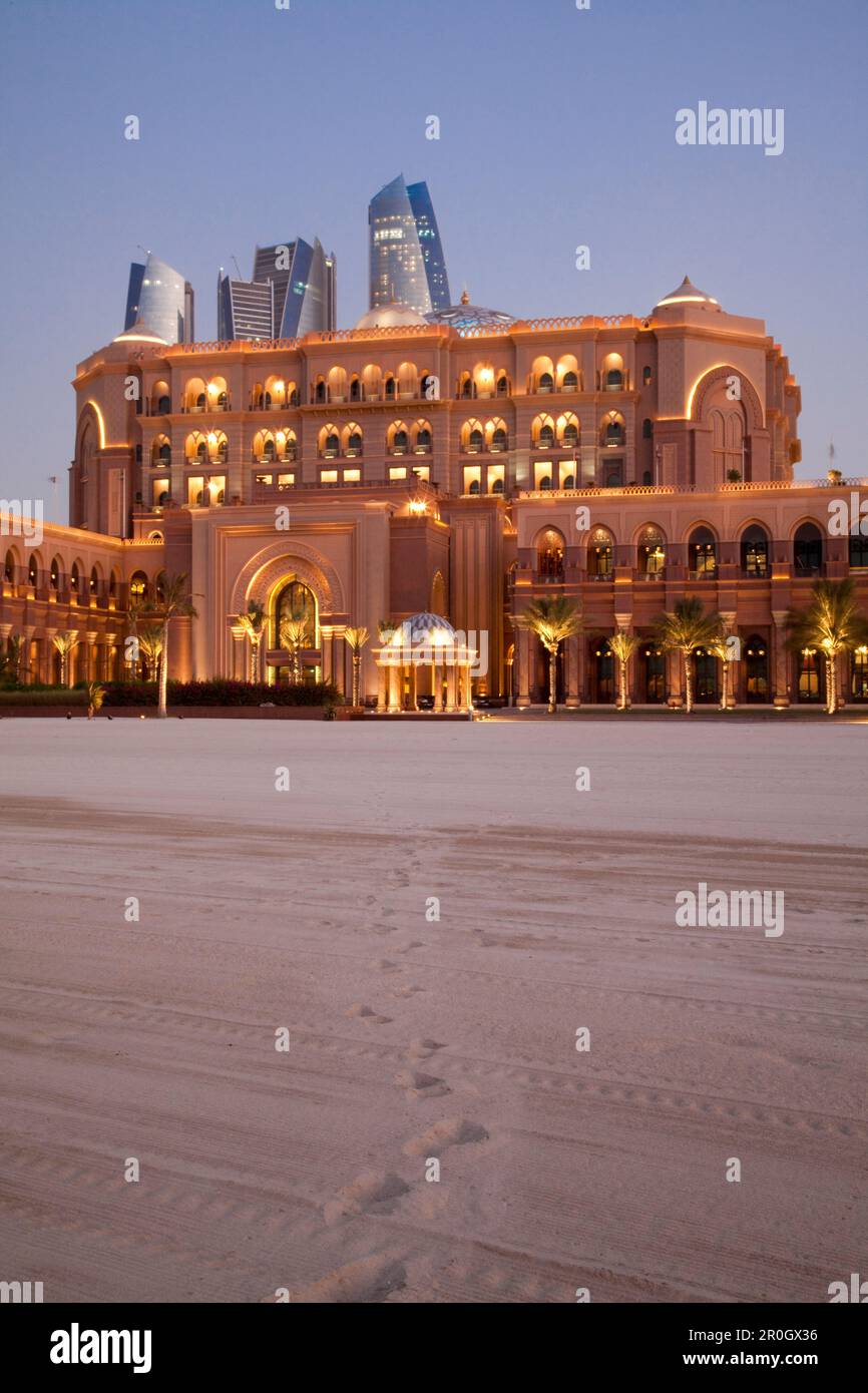 Emirates Palace hotel and high-rise buildings at dusk, Abu Dhabi ...