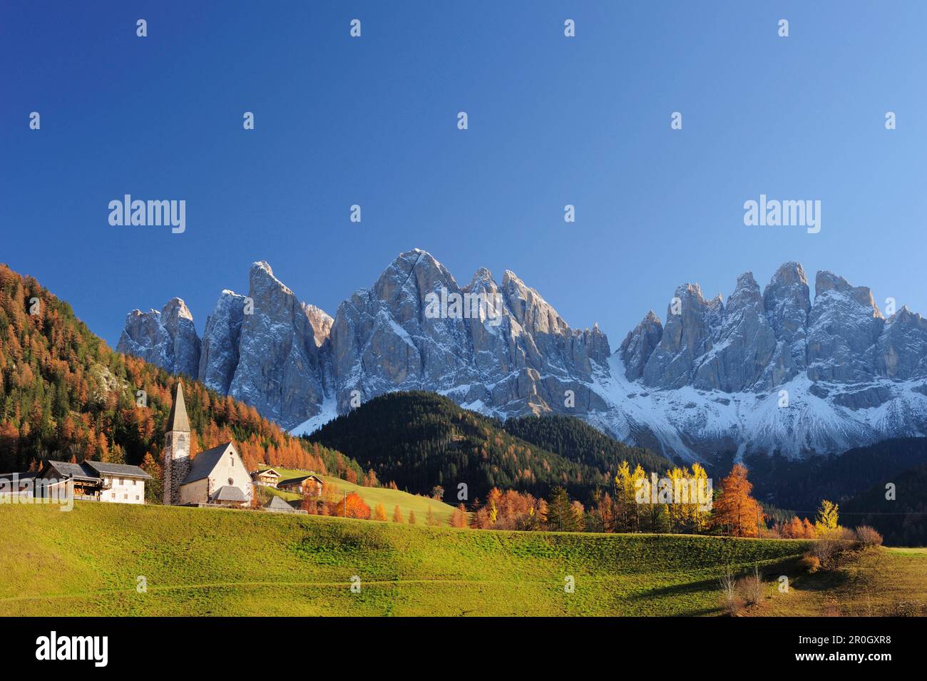 St Magdalena in front of Geisler range in autumn, St Magdalena, valley ...