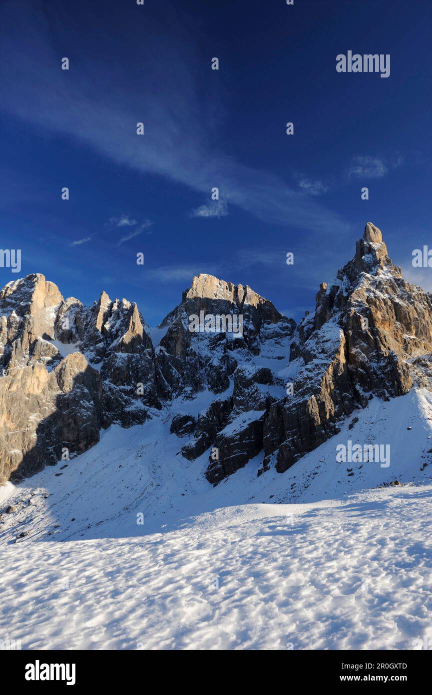 Rock crags of Pala range with Cimon della Pala in the snow, Pala range ...