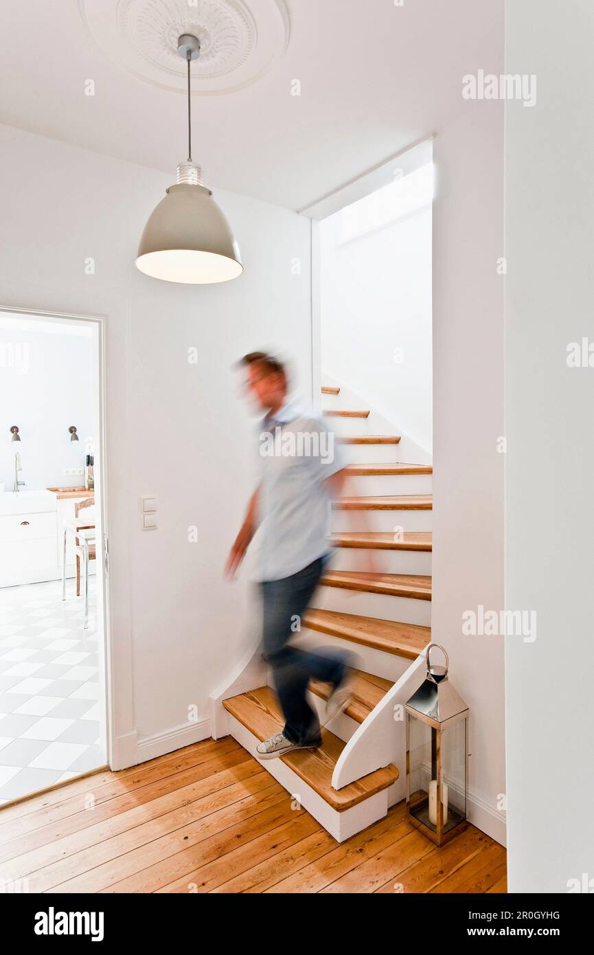 Man Walking Down Stairs In A House The Stomp, Walking Up The Stairs Of