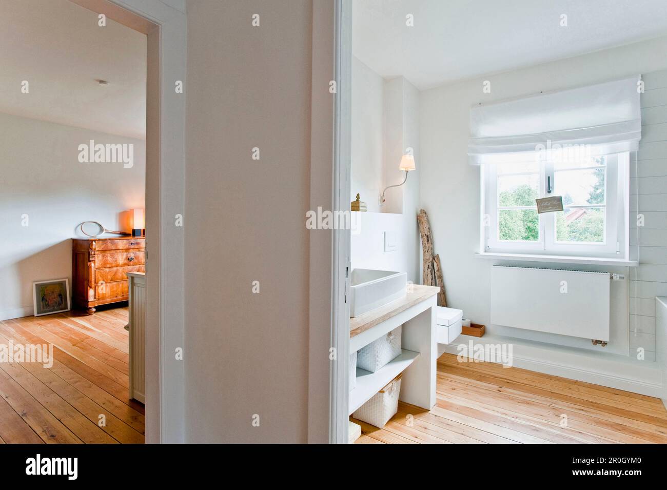 View into the bedroom and bathroom, House furnished in country style ...
