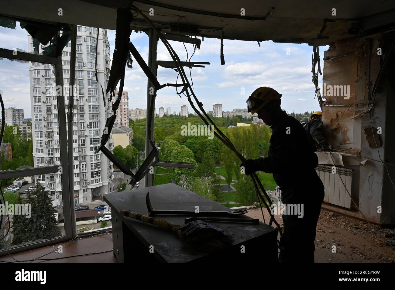 Kyiv, Ukraine. 08th May, 2023. Rescuers seen in multi-storey ...