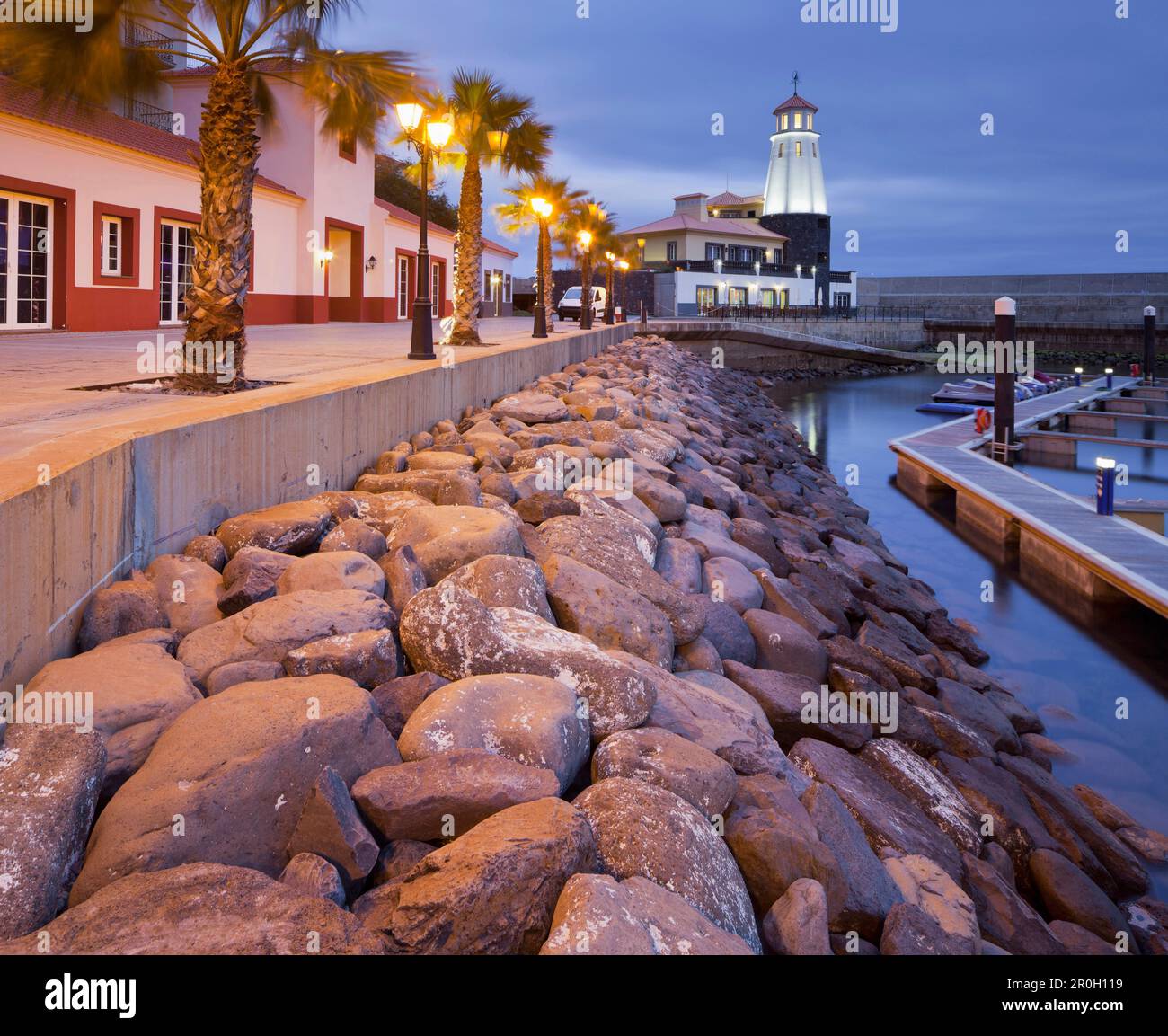 Lighthouse in Sa da Piedade harbour, waterfront, Ponta de Sao Lourenço ...