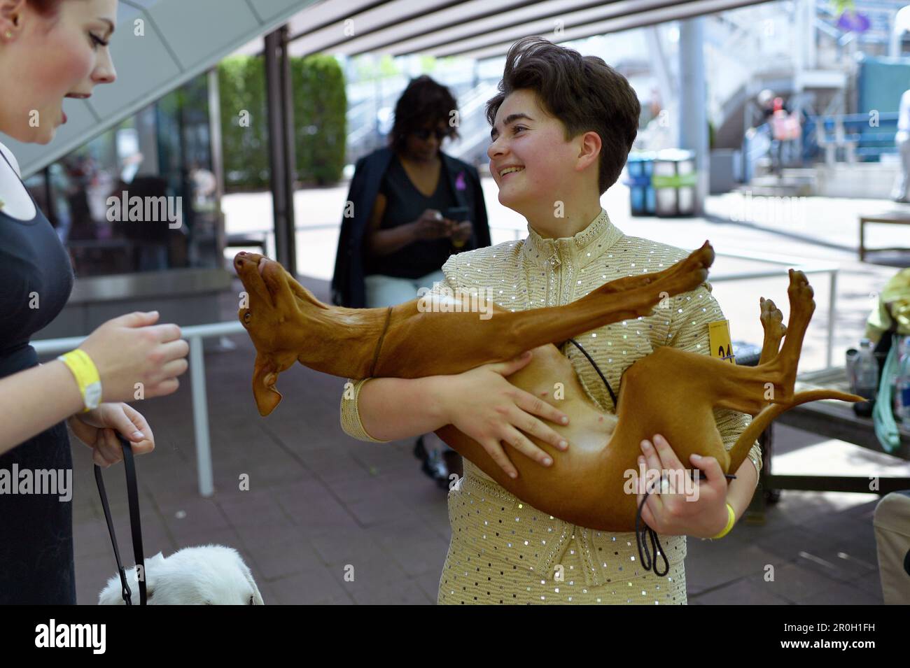 New York, USA. 08th May, 2023. Junior handler Audrey Boyer (r) holds ...