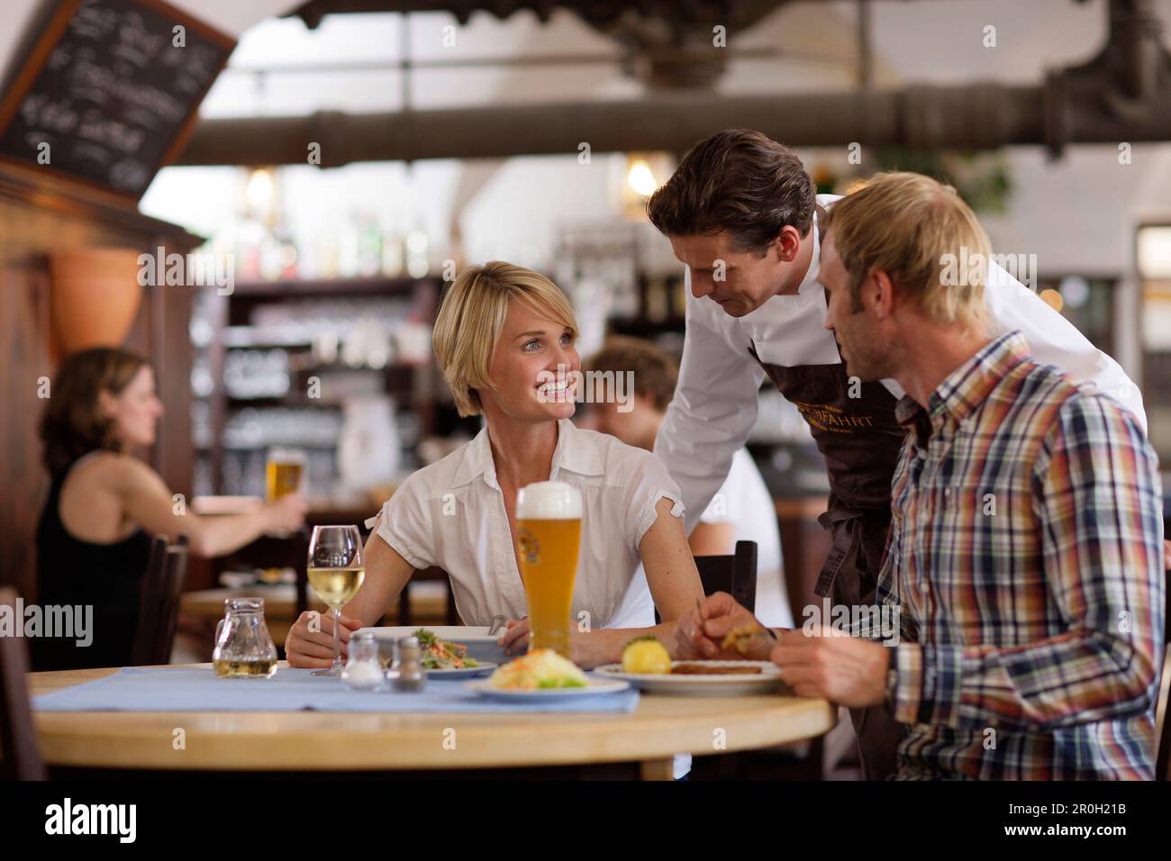 People in a restaurant Stock Photo - Alamy
