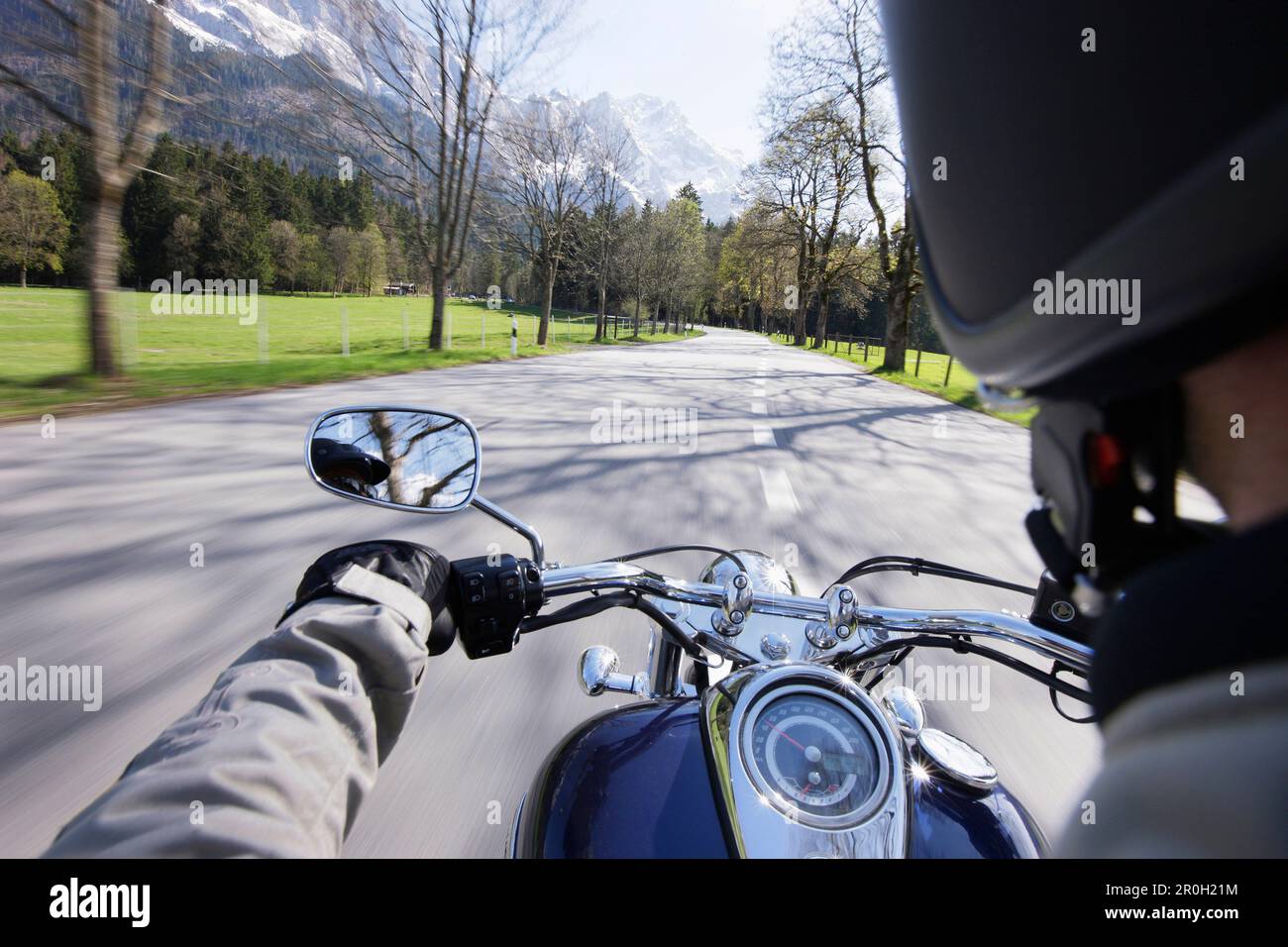 Motorbike tours around Garmisch, motorbiker on the road to Lake Eibsee ...