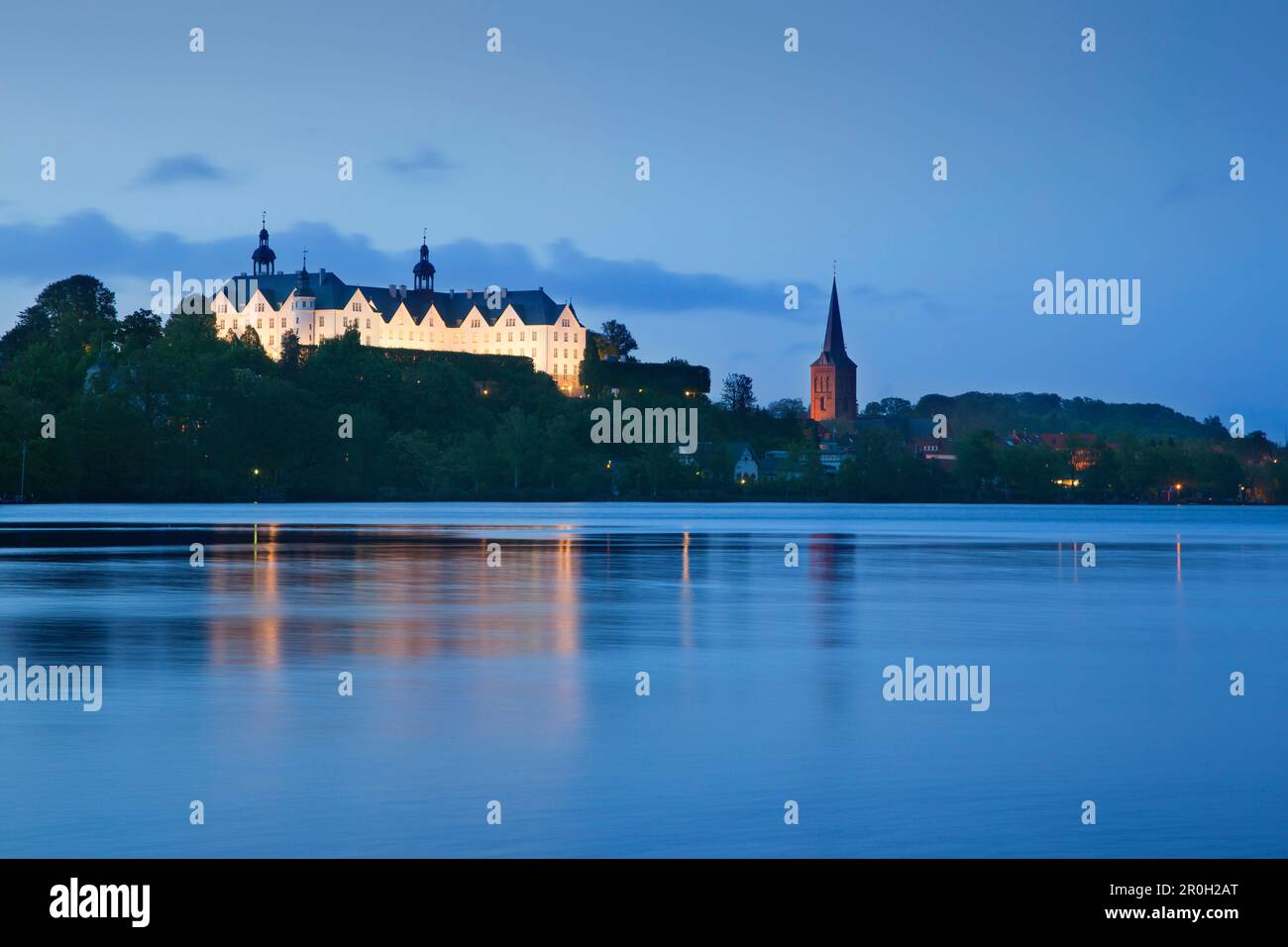 View over lake Grosser Ploener See onto the castle and the Nikolai ...