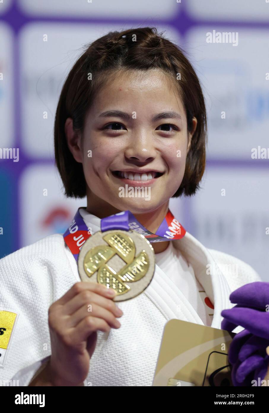 Uta Abe of Japan celebrates during an award ceremony of women's -52 kg ...