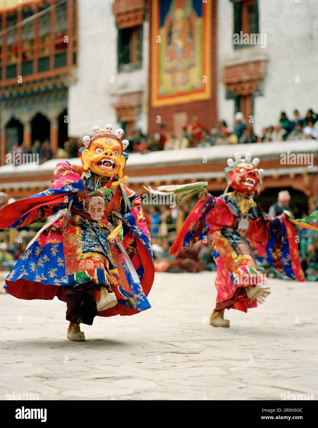 Dance of masks in the courtyard during the Hemis Gonpa Festival at ...