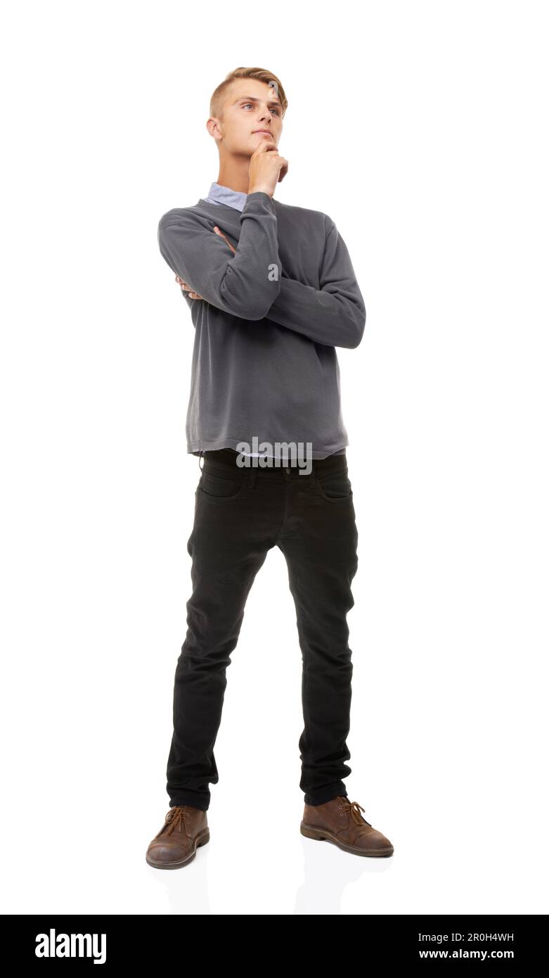 Pondering his fashion sense. Full length studio shot of a young man ...