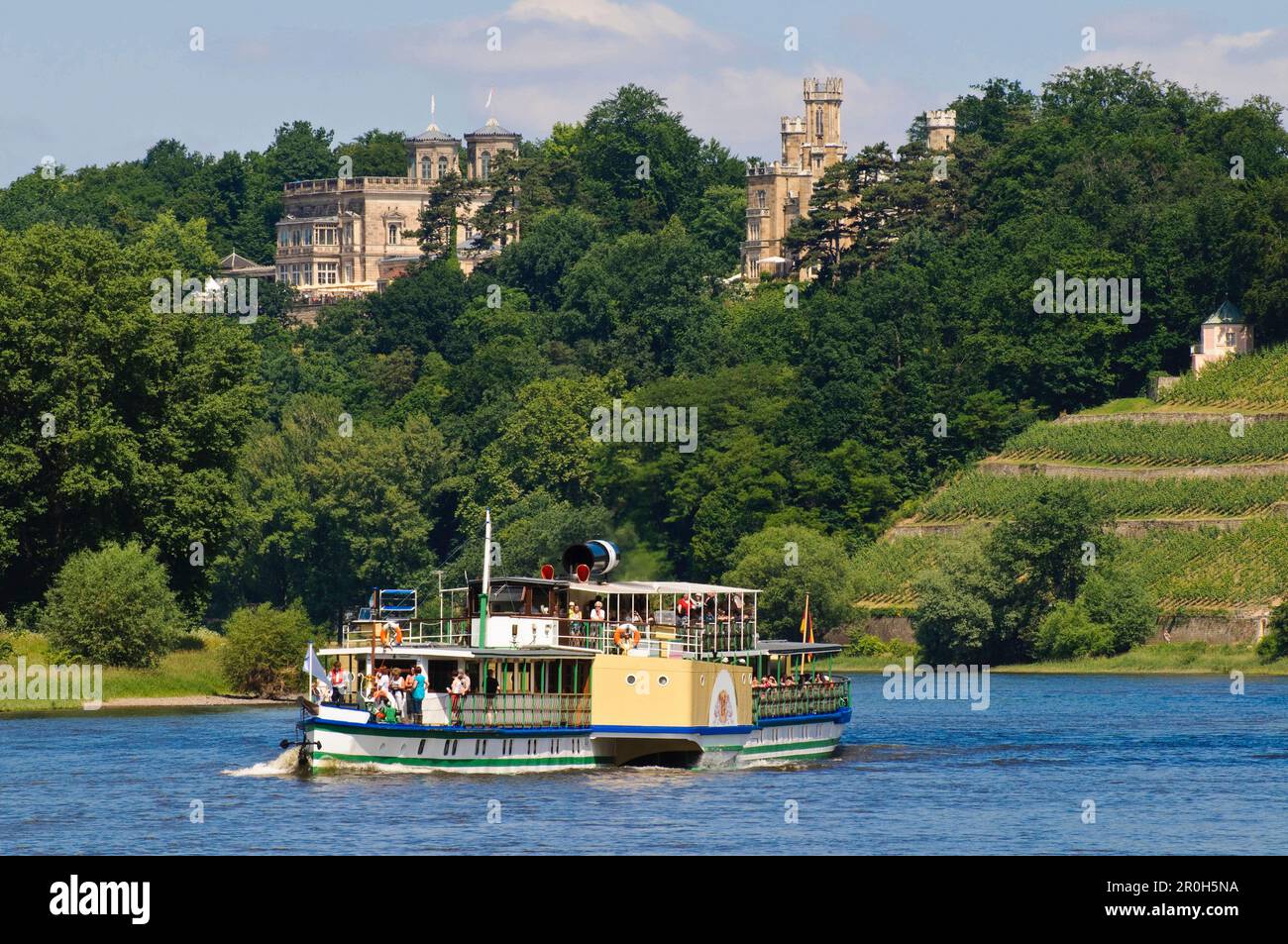 Steamboat on Elbe river in front of Eckberg castle and Lingner castle ...