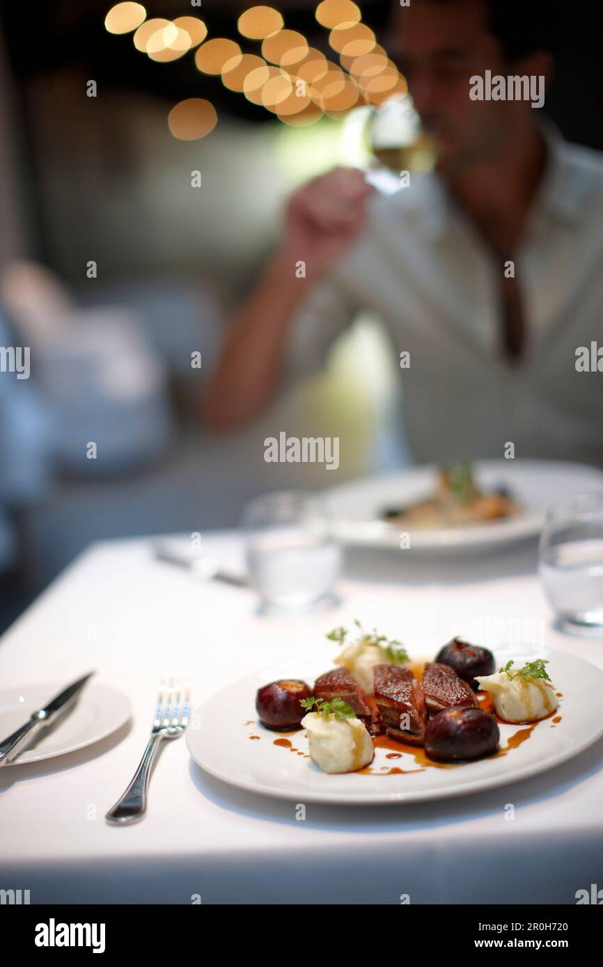 Guest having dinner at a restaurant, Paris, France Stock Photo - Alamy