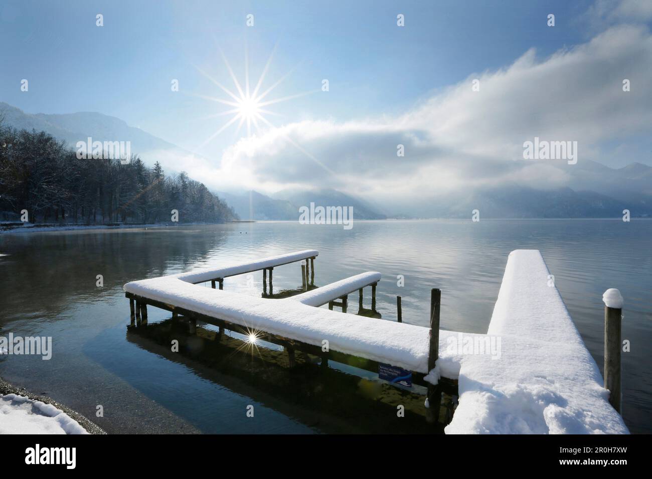 Snow-covered jetty at lake Kochel, Kochel, Bavaria, Germany Stock Photo ...