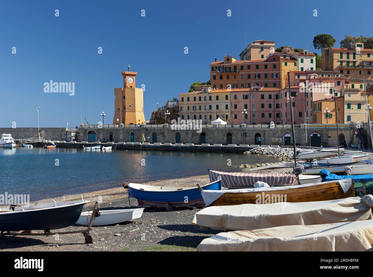 Fishing boats on the beach next to the fortress, Port of Rio Marina ...