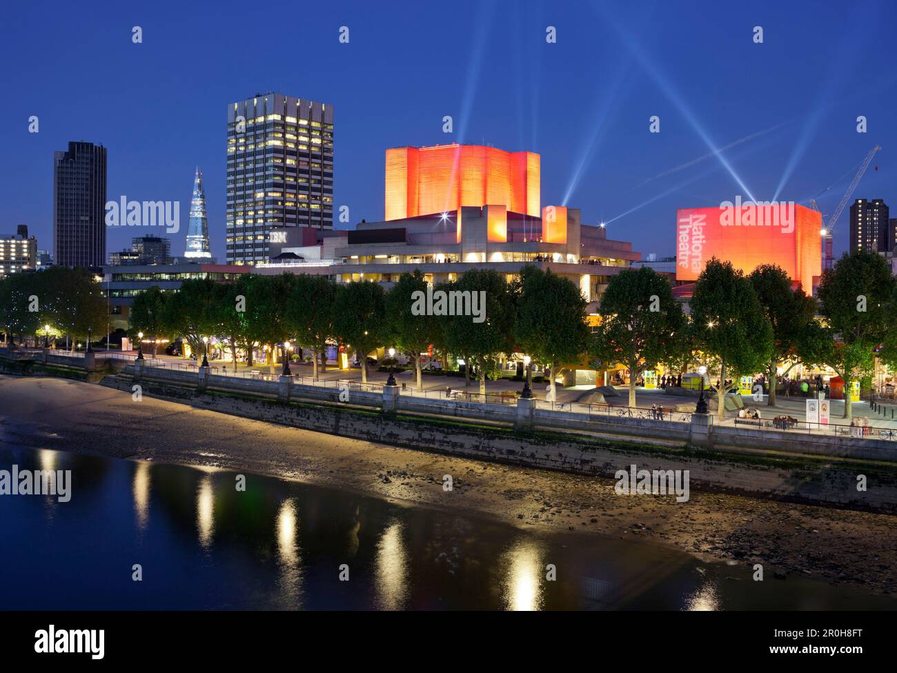 Royal National Theatre with red lights at night, Waterloo Bridge ...