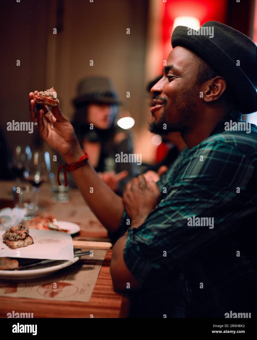 Man holding two plates of food hi-res stock photography and images - Alamy