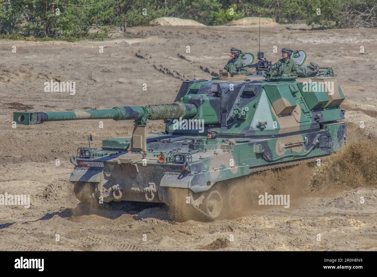 Polish soldiers maneuver an AHS Krab, a self-propelled tracked gun ...