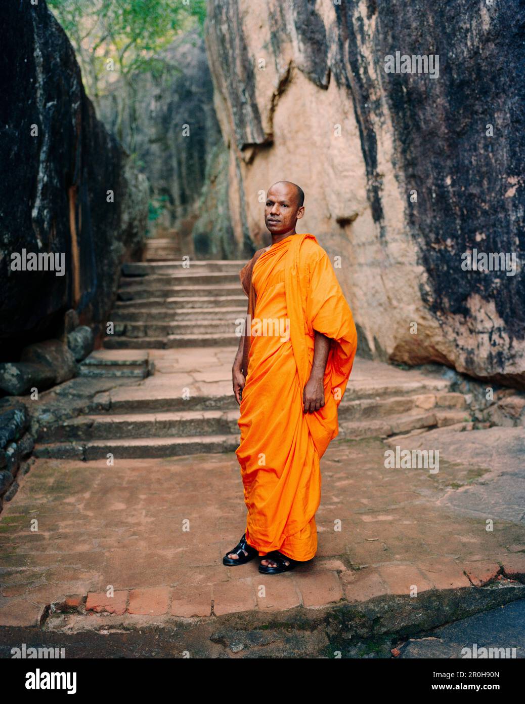 SRI LANKA, Asia, portrait of a Monk man standing at Sigiriya Stock ...