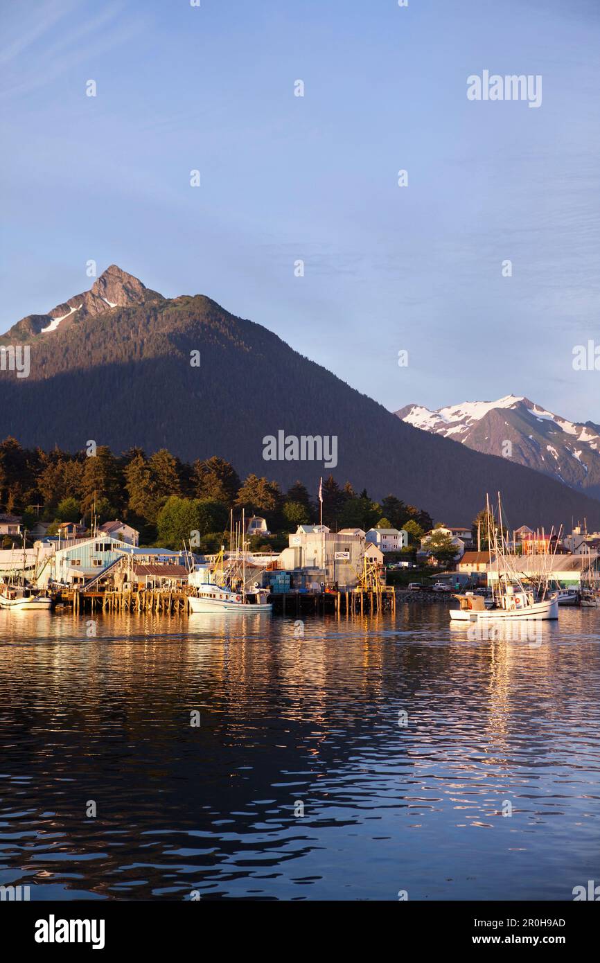 ALASKA, Sitka, a peaceful view of homes and fishing boats along the ...