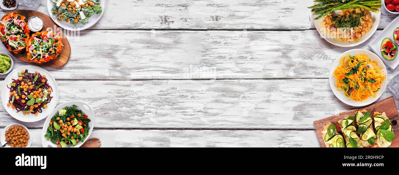 Healthy plant based low carb food double border. Above view over a ...