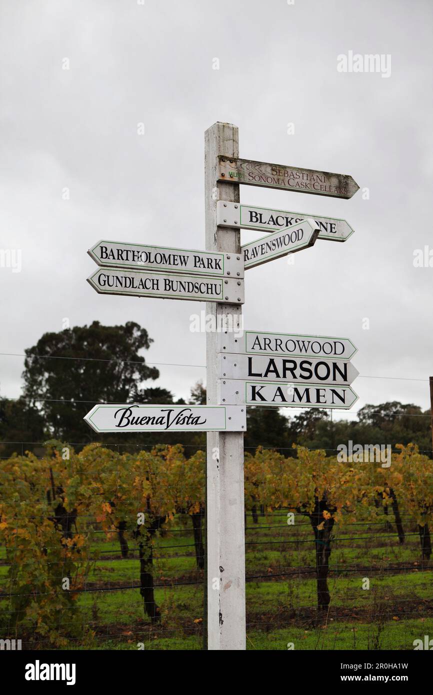 USA, California, Sonoma, signs point the way to the many vineyards in ...