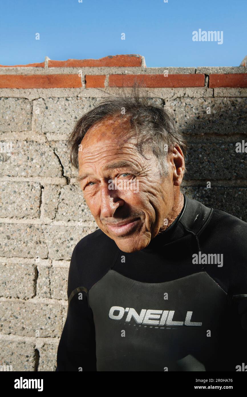 USA, California, Malibu, portrait of a local surfer Mysto George at ...